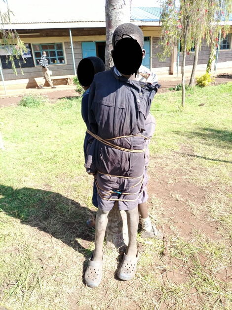 Uproar Over Viral Photo of 3 Pupils Tied to a Tree - Kenyans.co.ke